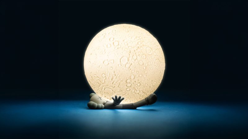 The KAWS BIG MOON Lamp: The Glow Of Artistic Brilliance - IMBOLDN